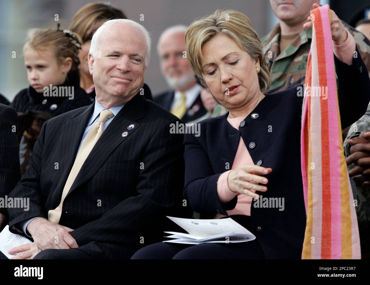 Sen. John McCain, R-Ariz., left, smiles as Sen. Hillary Rodham Clinton ...