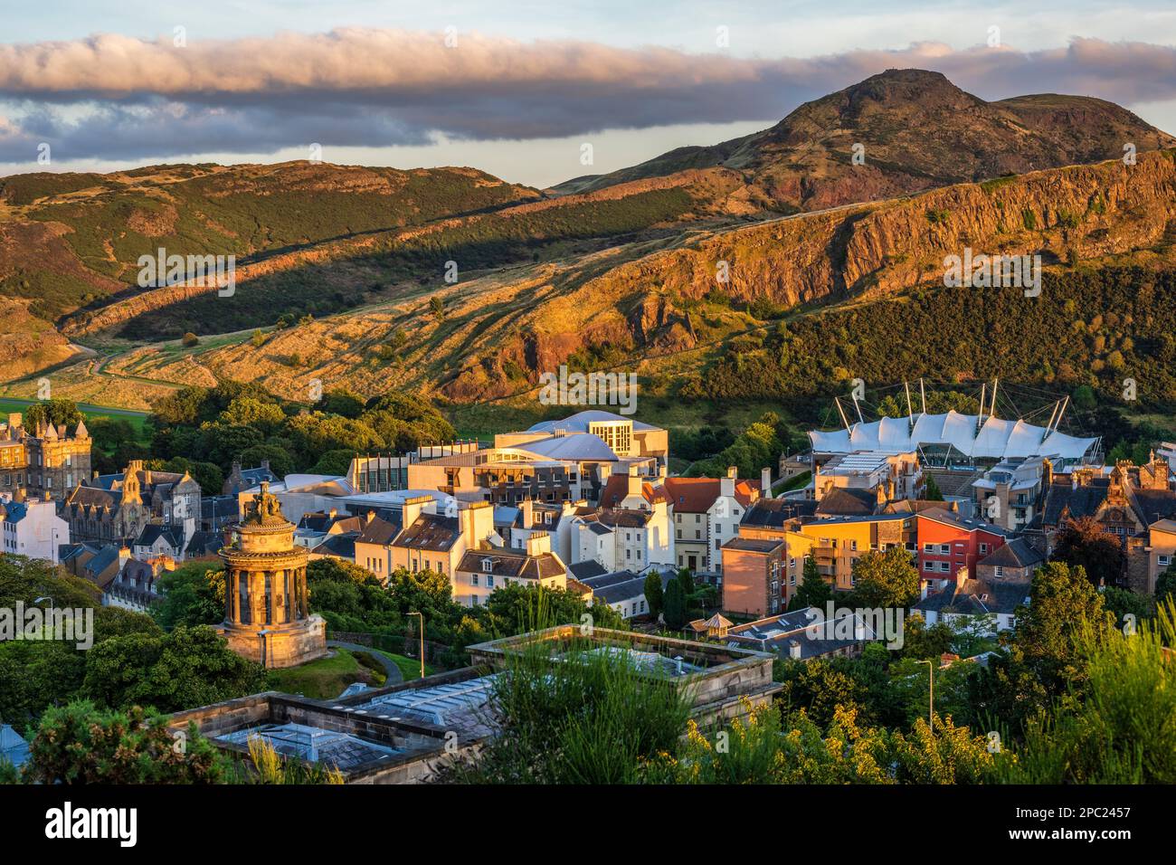 Arthur’s Seat at sunset with Burns Monument, Scottish Parliament ...