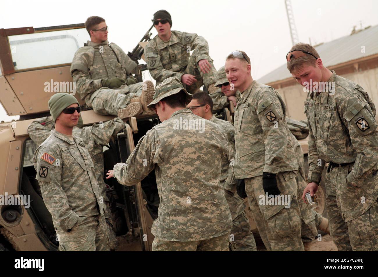 Soldiers from Alpha Company, 4th Battalion, 31st Infantry Regiment rest ...
