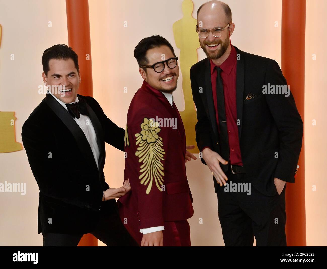 (L-R) Jonathan Wang, Daniel Kwan, and Daniel Scheinert attend the 95th ...
