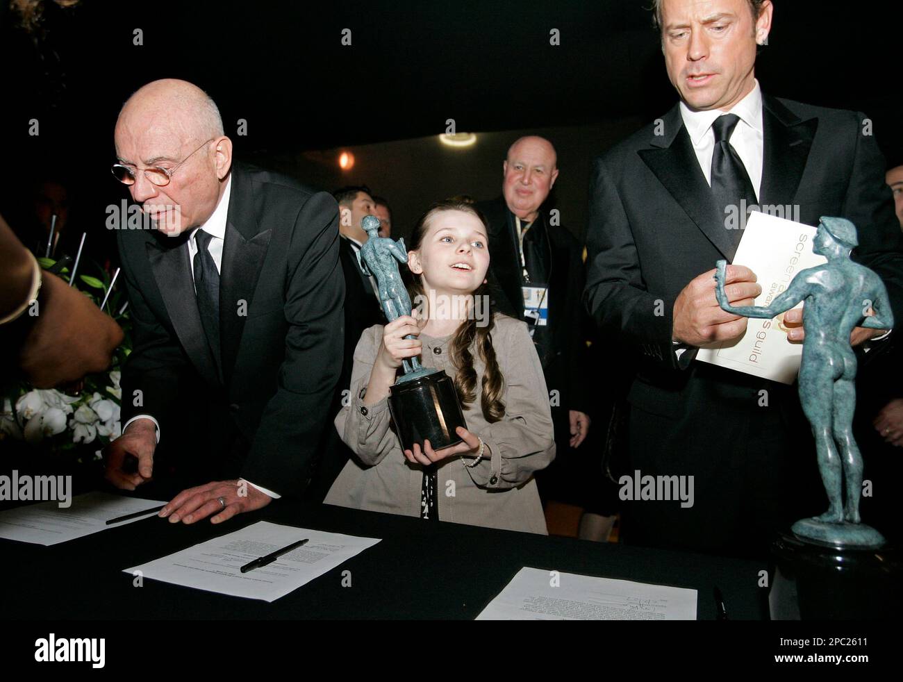 Alan Arkin, left, Abigail Breslin, center, and Greg Kinnear receive ...