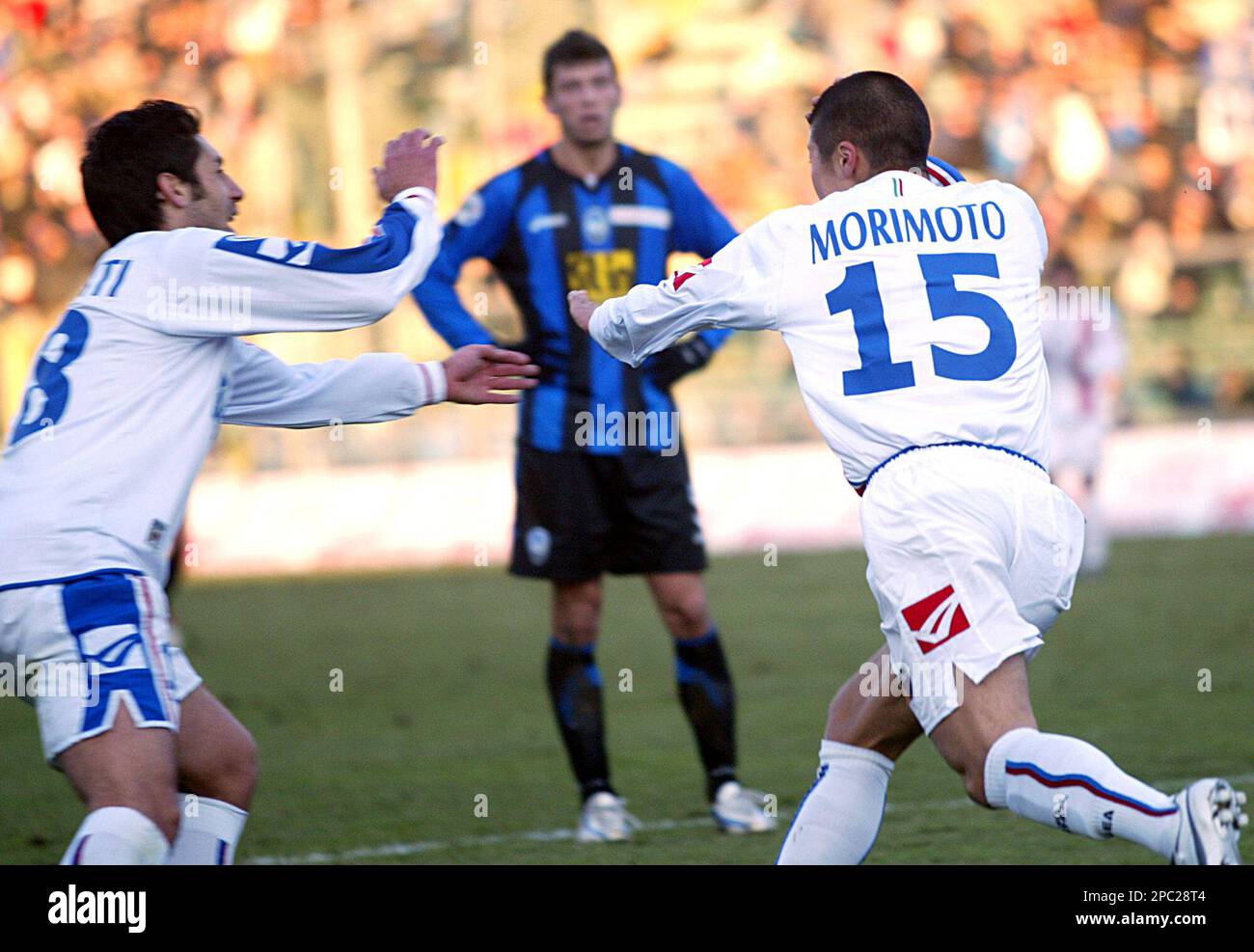 Catania's Takayuki Morimoto, right, of Japan reacts after scoring ...