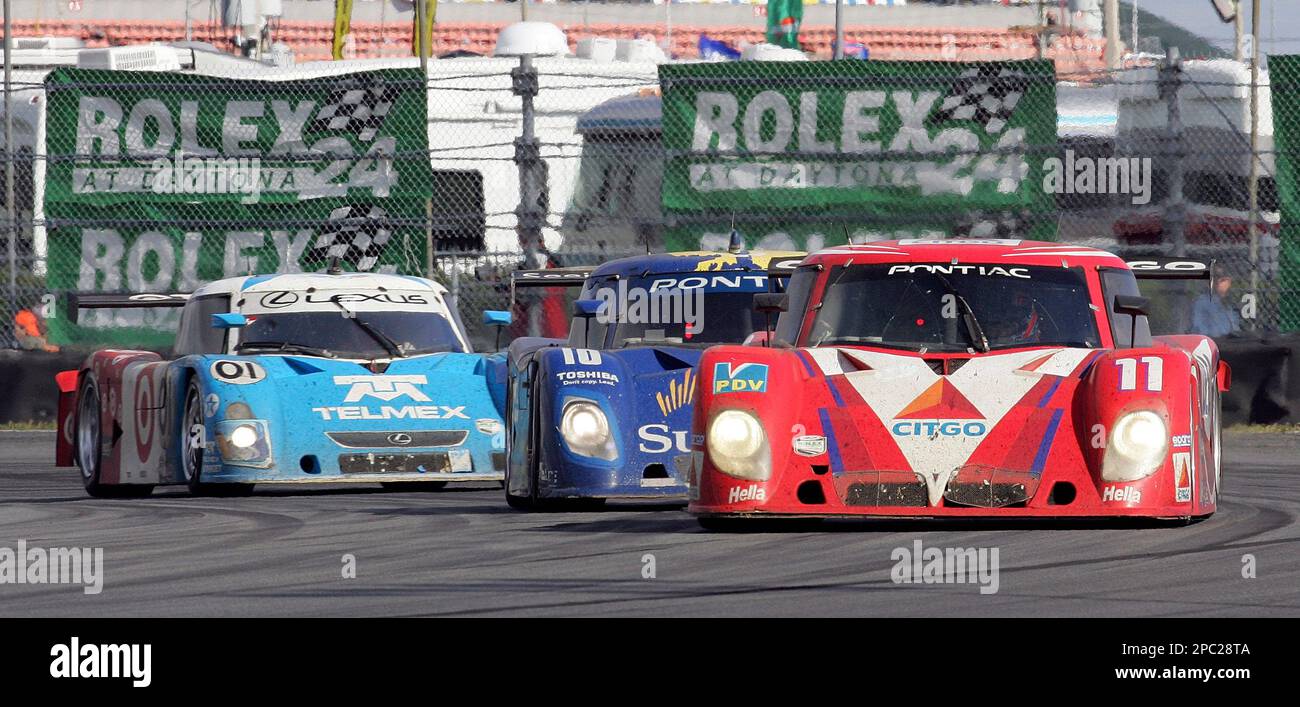 The No. 01 Lexus Riley, left, the No. 10 Pontiac Riley, center, and the ...