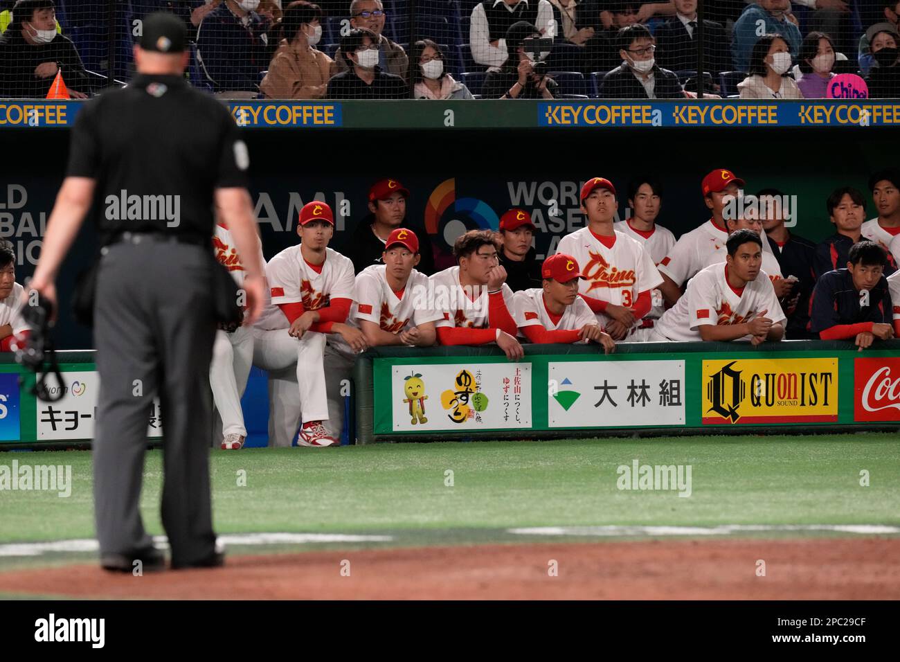Chinese players react after finishing the first round Pool B game ...