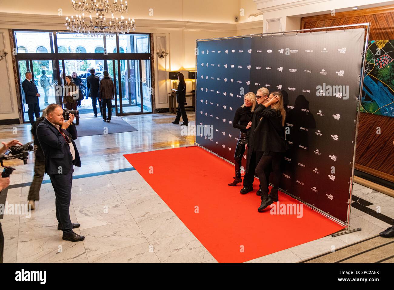 Models posing at Riga Fashion Week event held at Kempinski Grand Hotel ...