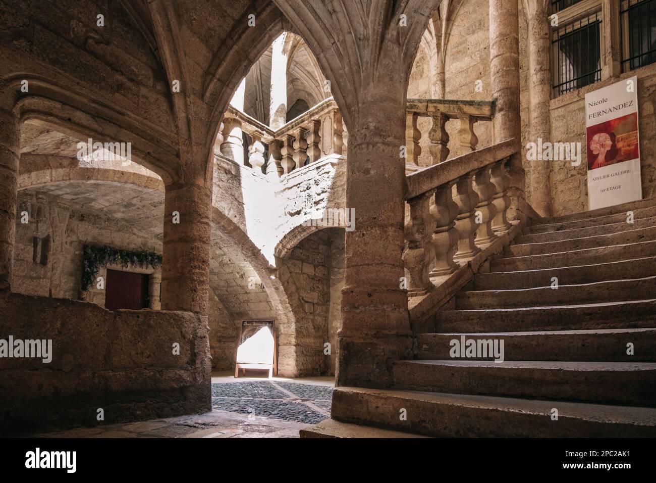 Inner courtyard of the 16th medieval townhouse of Lacoste Barons in the ...