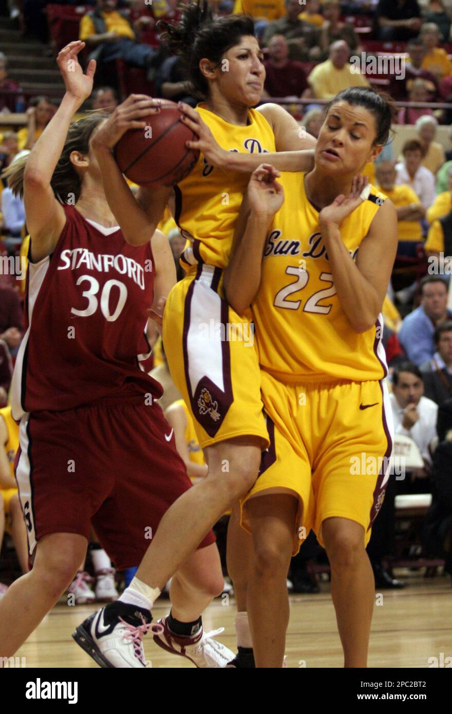 Arizona State forward Amy Westerberg, center, grabs a defensive rebound ...