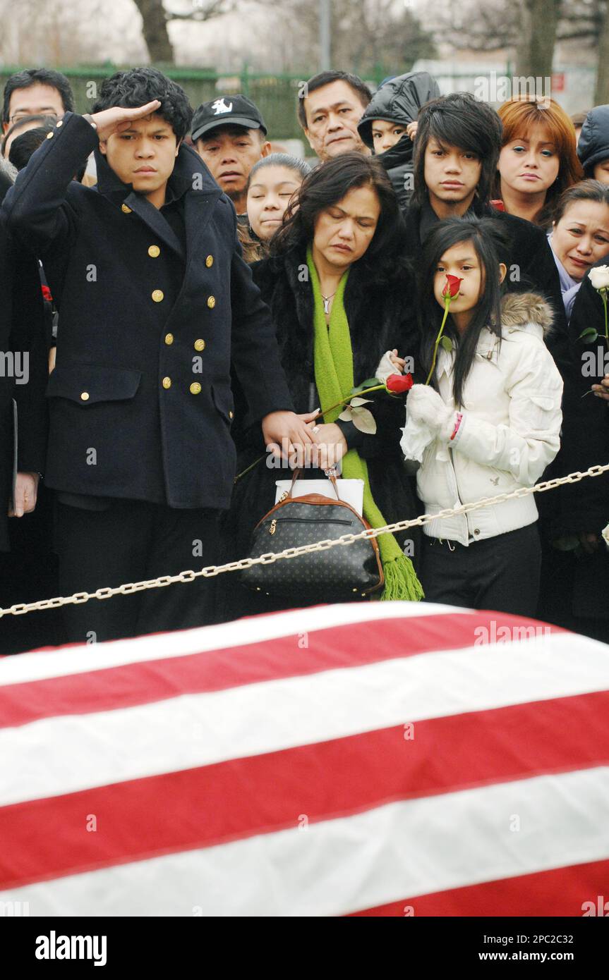 Ceasar Borja Jr., left, the son of retired New York City police officer ...