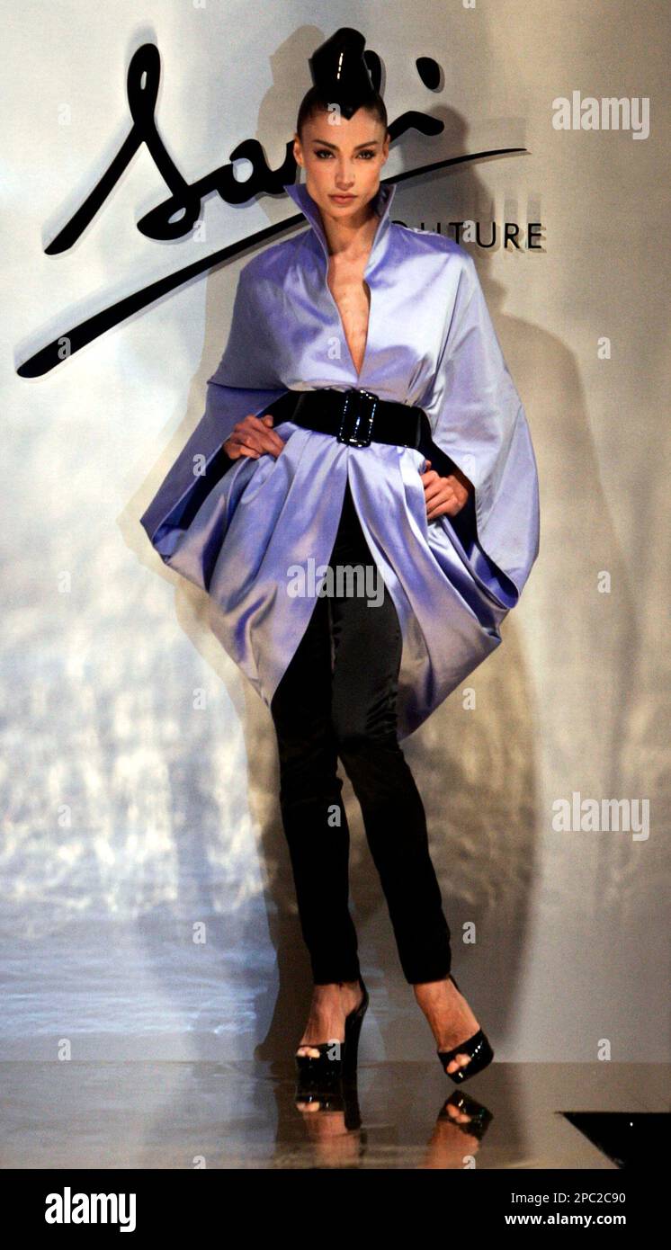 A model wears a creation by Italian fashion designer Fausto Sarli for ...