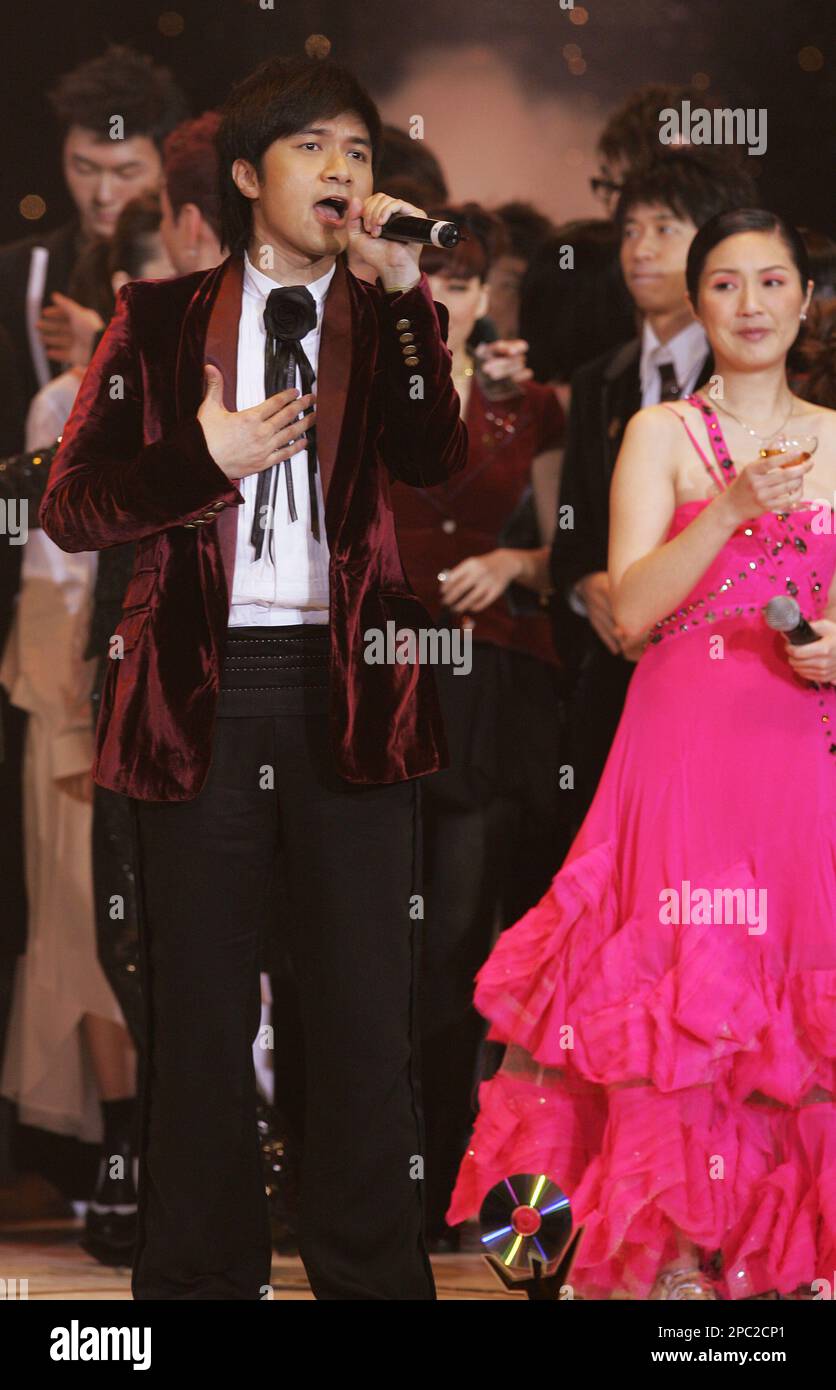 Hong Kong singer Leo Koo performs after receiving the Four Electronic ...