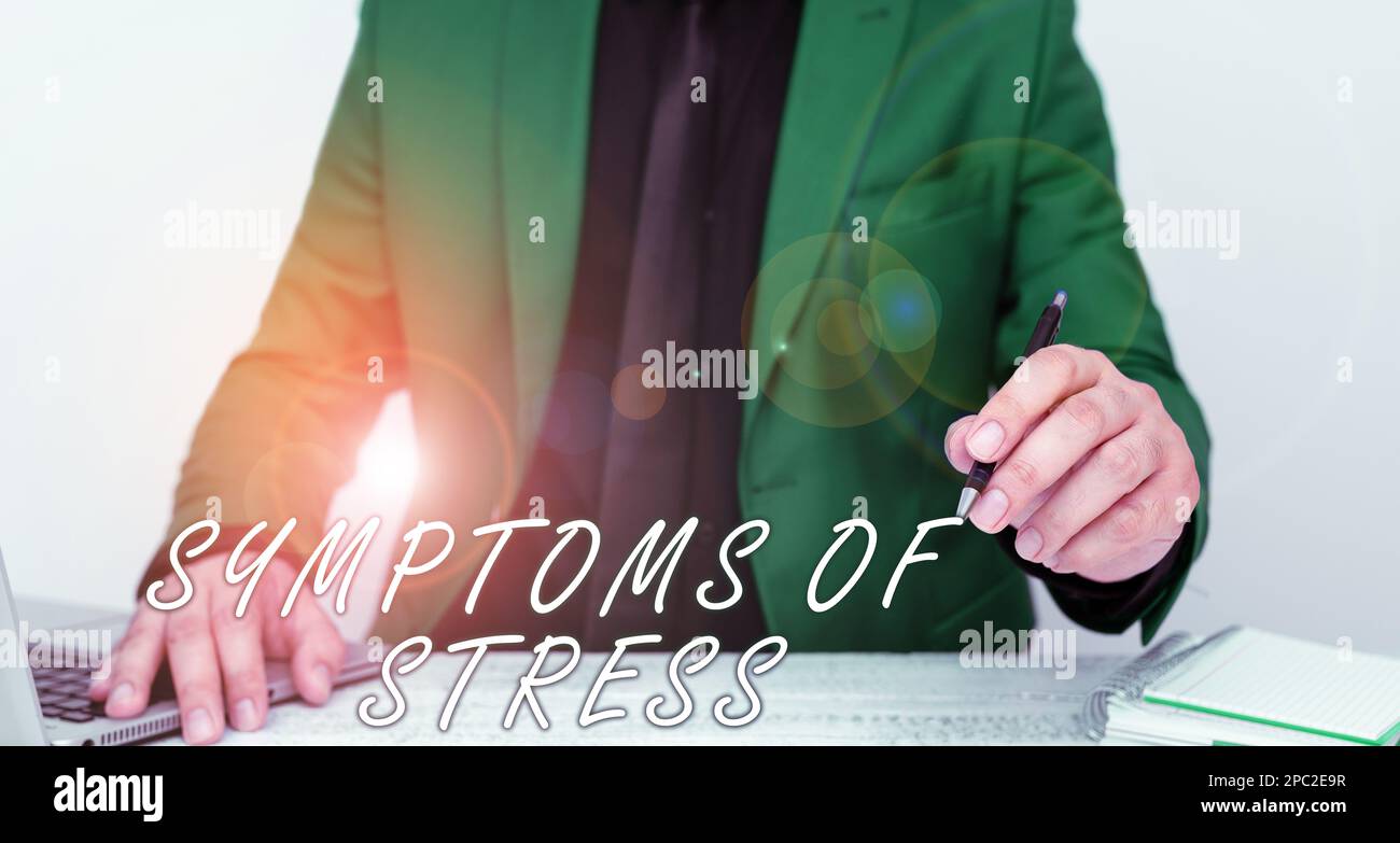 Hand writing sign Symptoms Of Stress. Concept meaning serving as ...