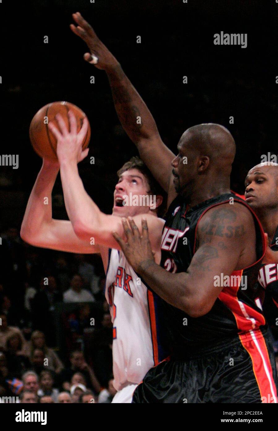 Miami Heat's Shaquille O'Neal, foreground, fouls New York Knicks' David ...