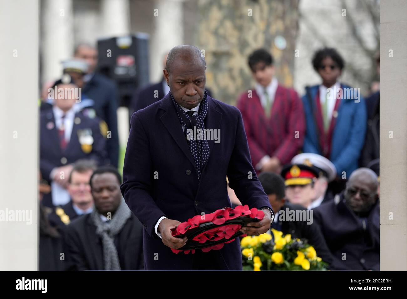 BBC News presenter Clive Myrie lays a wreath during the Commonwealth ...