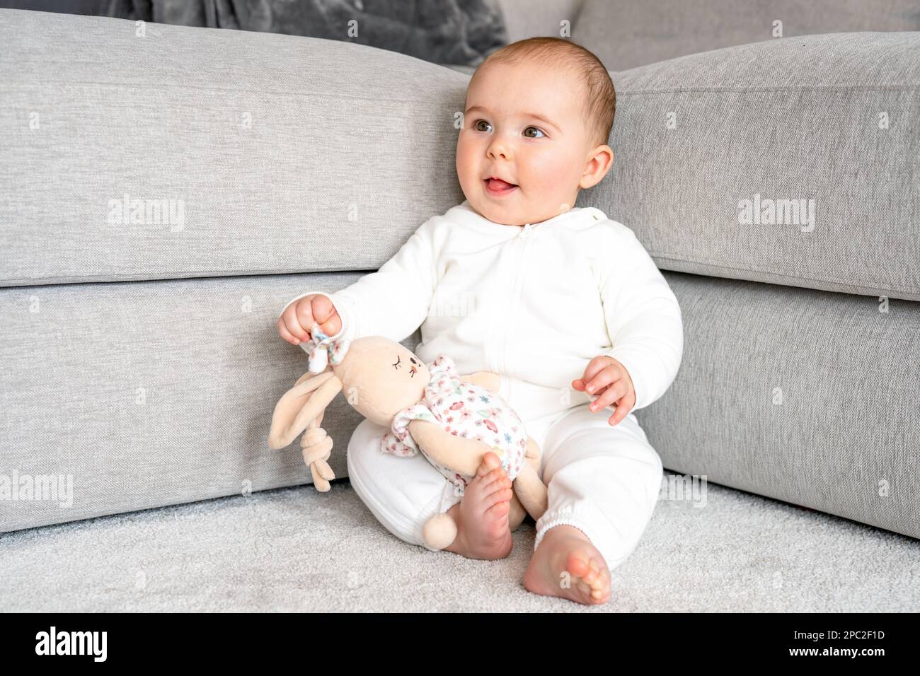 childhood, babyhood and people concept - happy little baby boy or girl ...