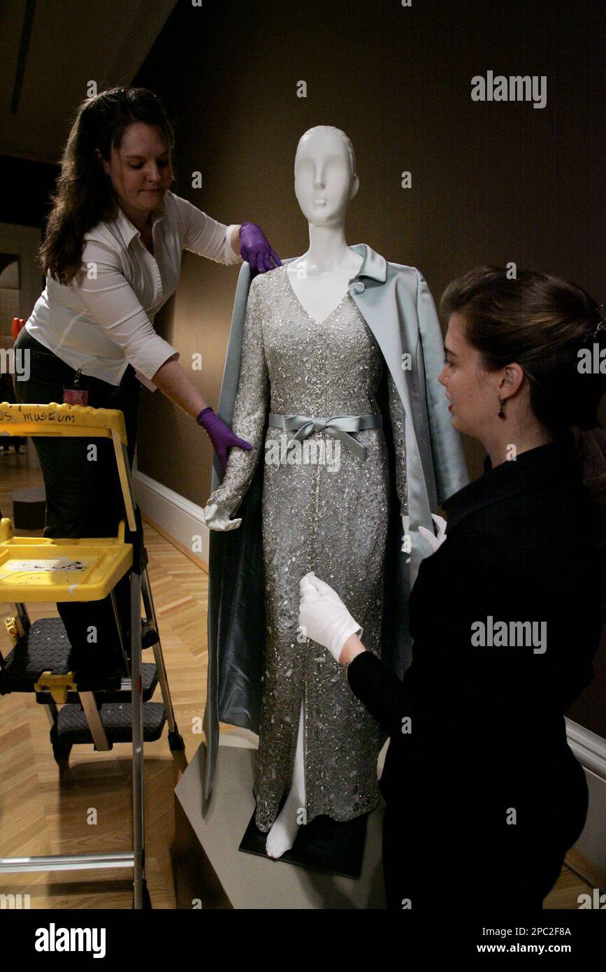 Melanie Sanford, left, and Bridget Marx make adjustments to an Oscar de ...