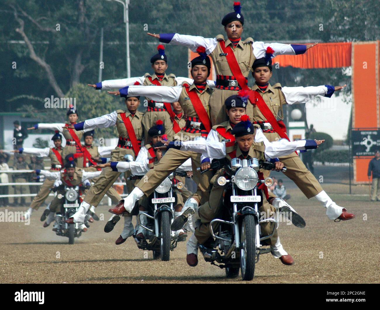 Police personnel display their acrobatic skills on motorcycles during ...