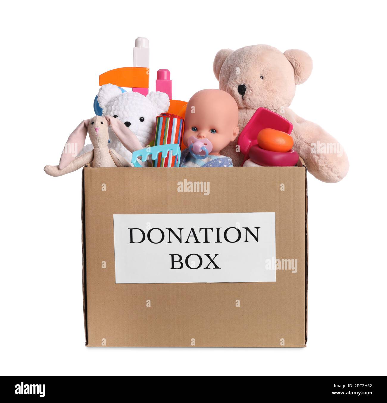 Donation box full of different toys isolated on white Stock Photo - Alamy