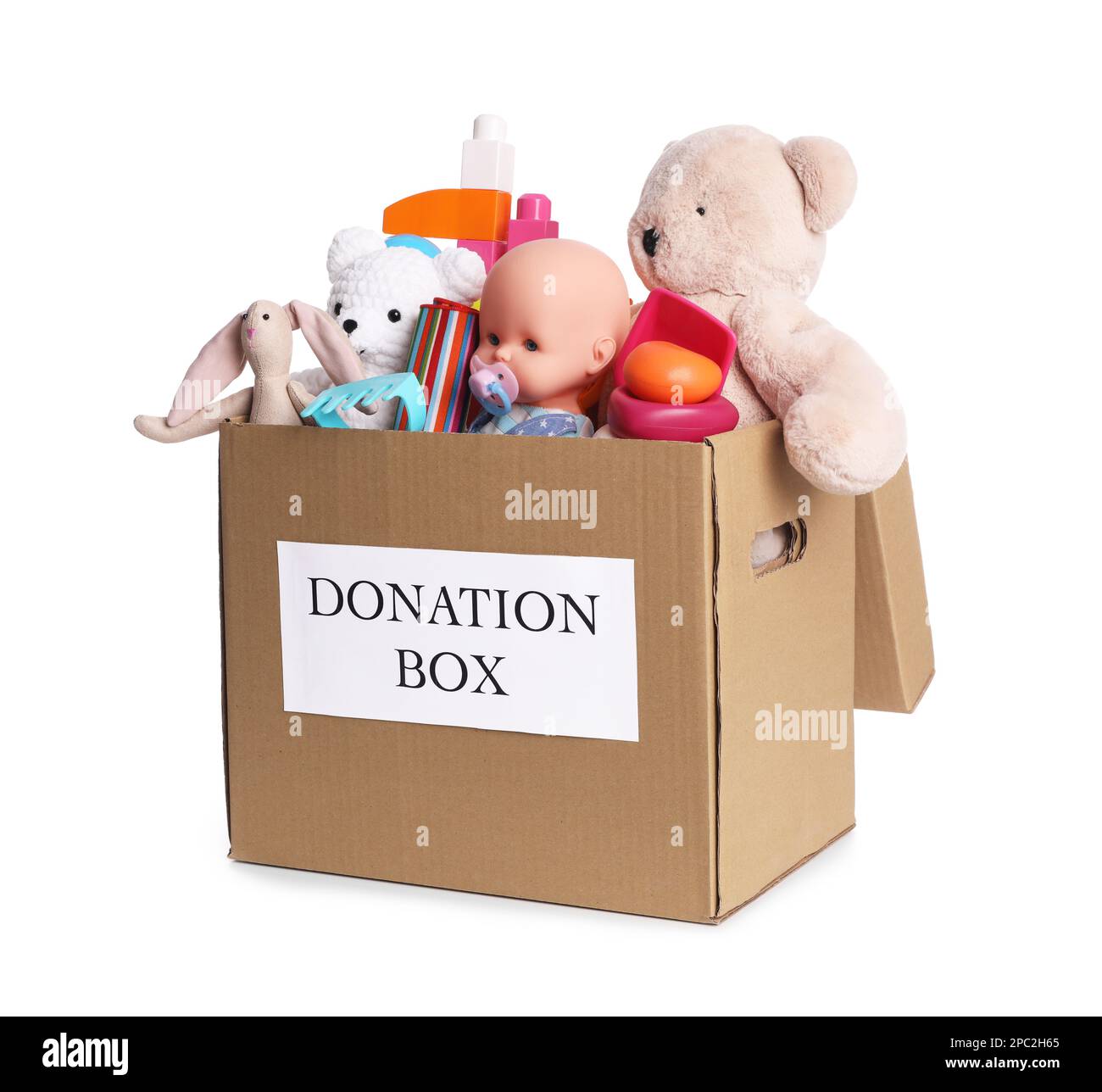Donation box full of different toys isolated on white Stock Photo - Alamy