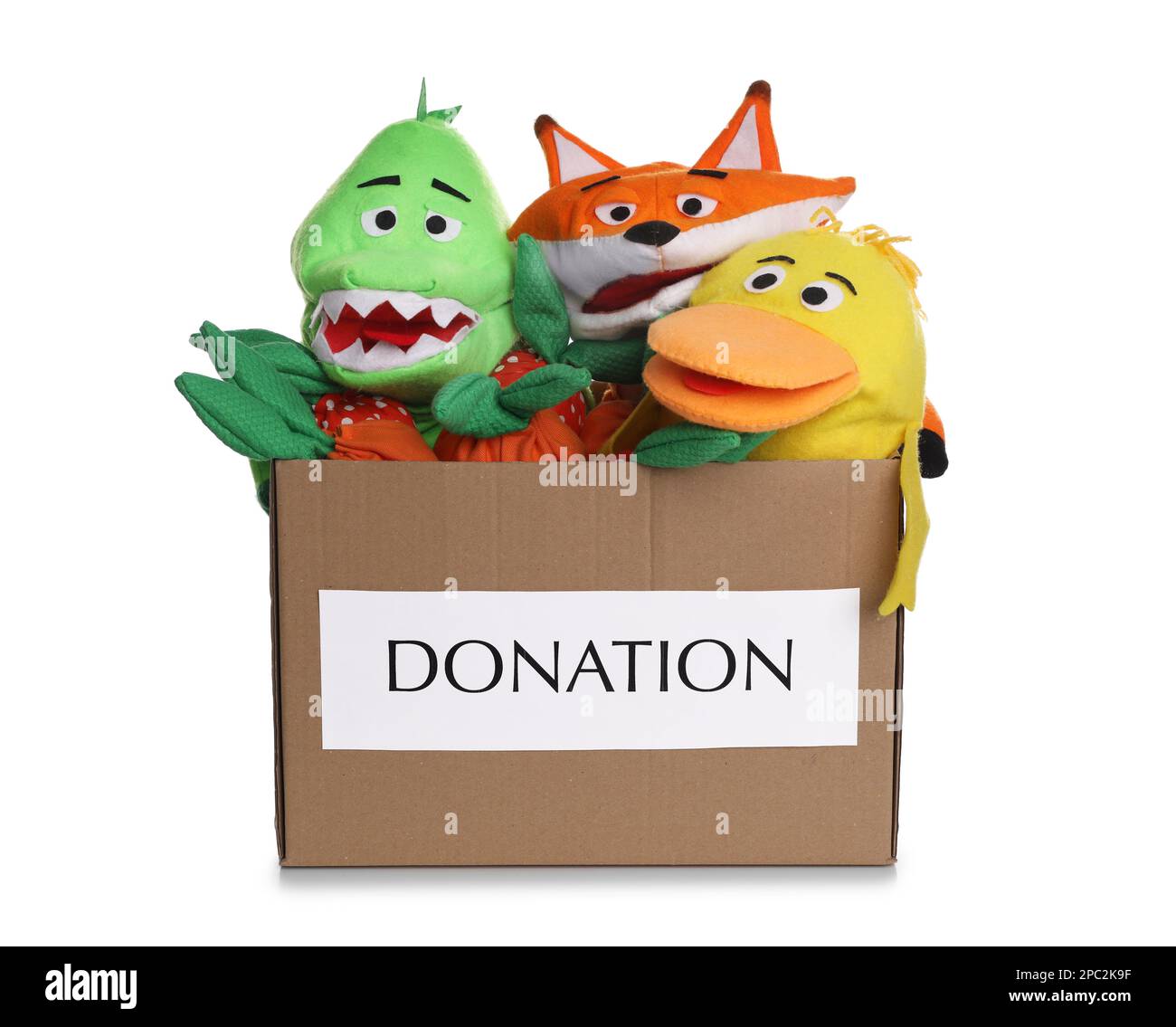 Donation box full of different toys isolated on white Stock Photo - Alamy