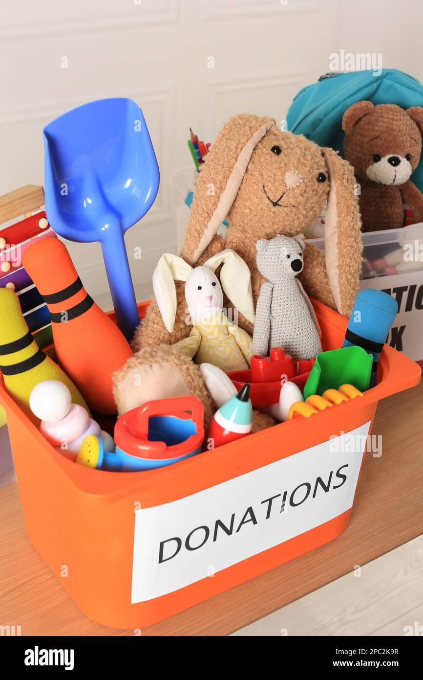 Child donation box toys hi-res stock photography and images - Alamy