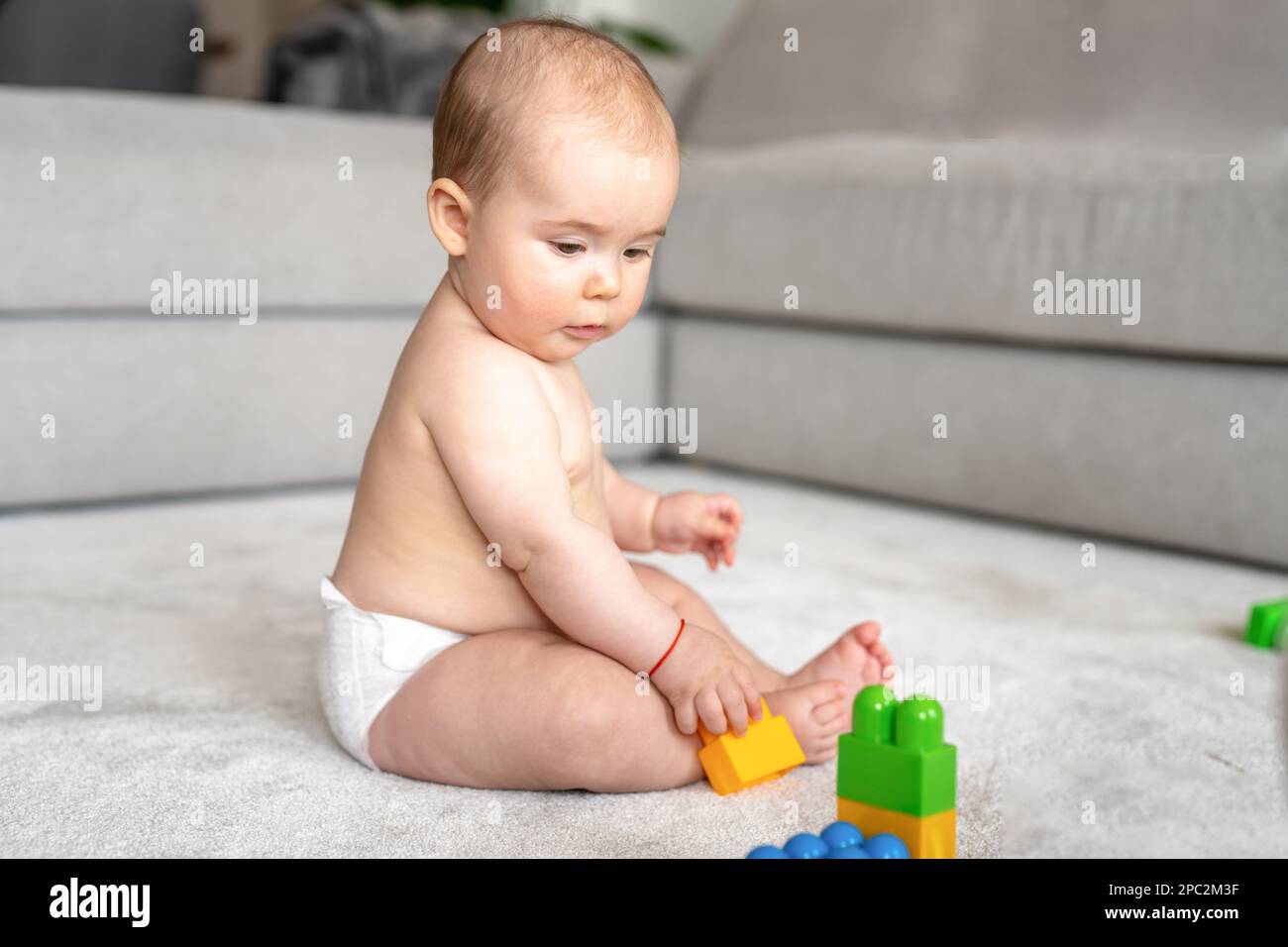 childhood, babyhood and people concept - happy little baby boy or girl ...