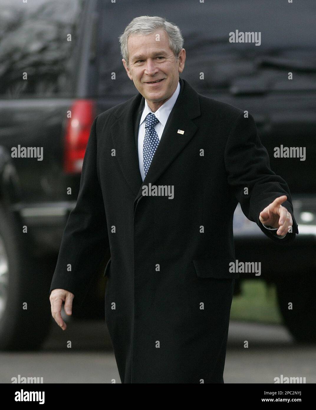 President Bush waves as he departs the White House in Washington ...