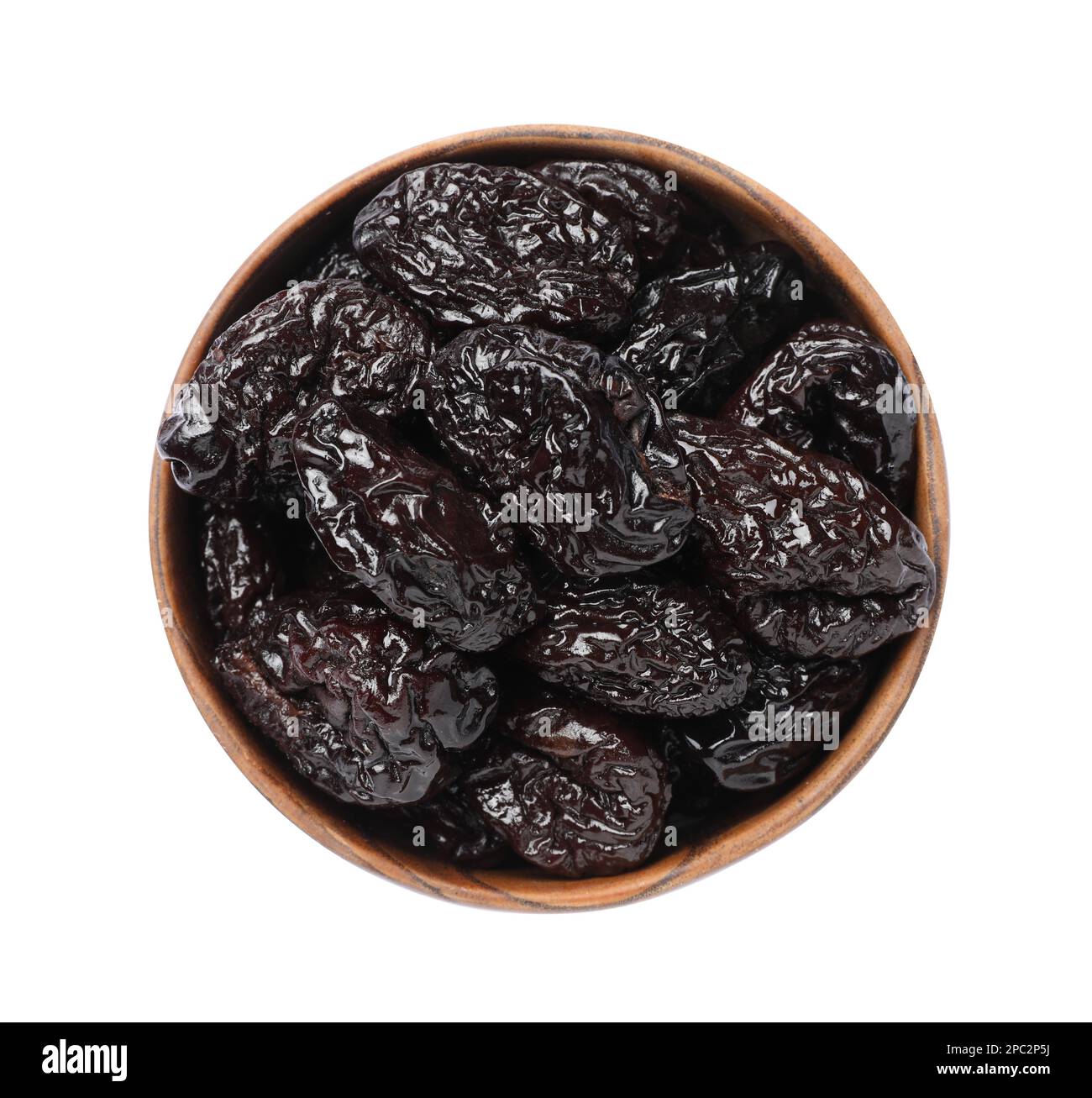 Bowl with sweet dried prunes isolated on white, top view Stock Photo ...