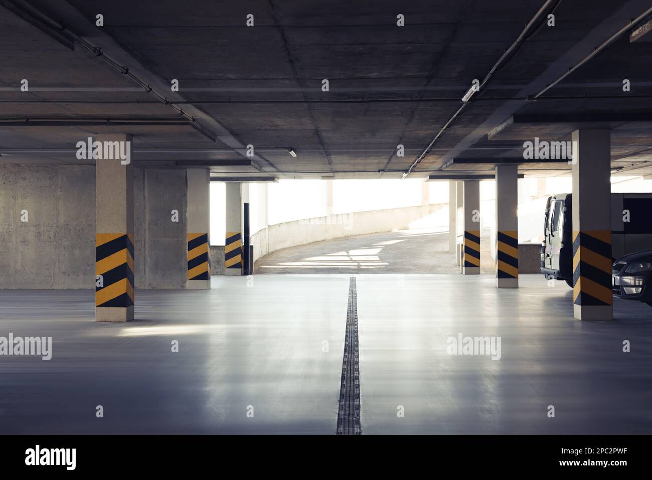Open car parking garage with ramp on sunny day Stock Photo - Alamy