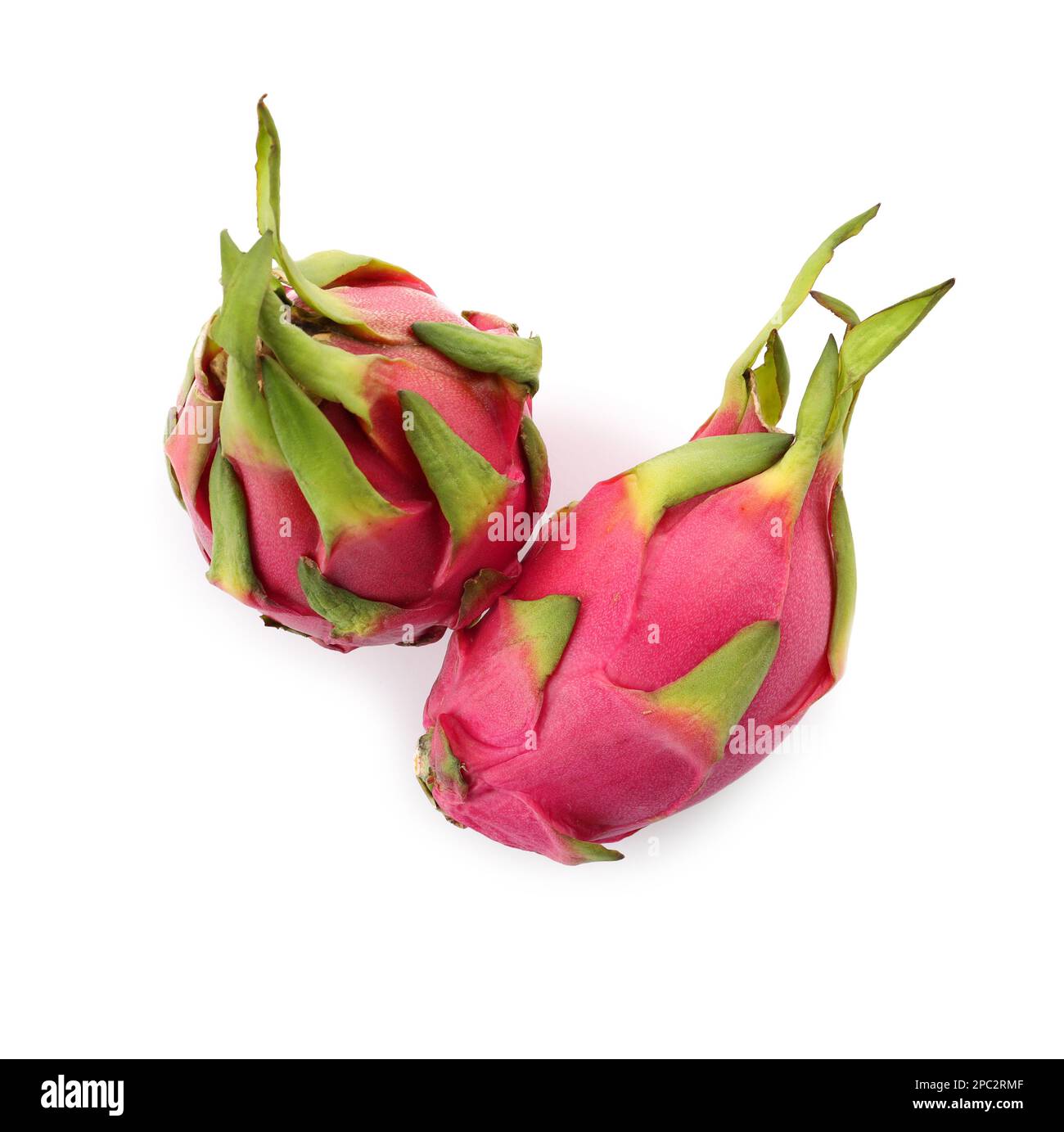 Delicious pink dragon fruits (pitahaya) on white background, top view ...