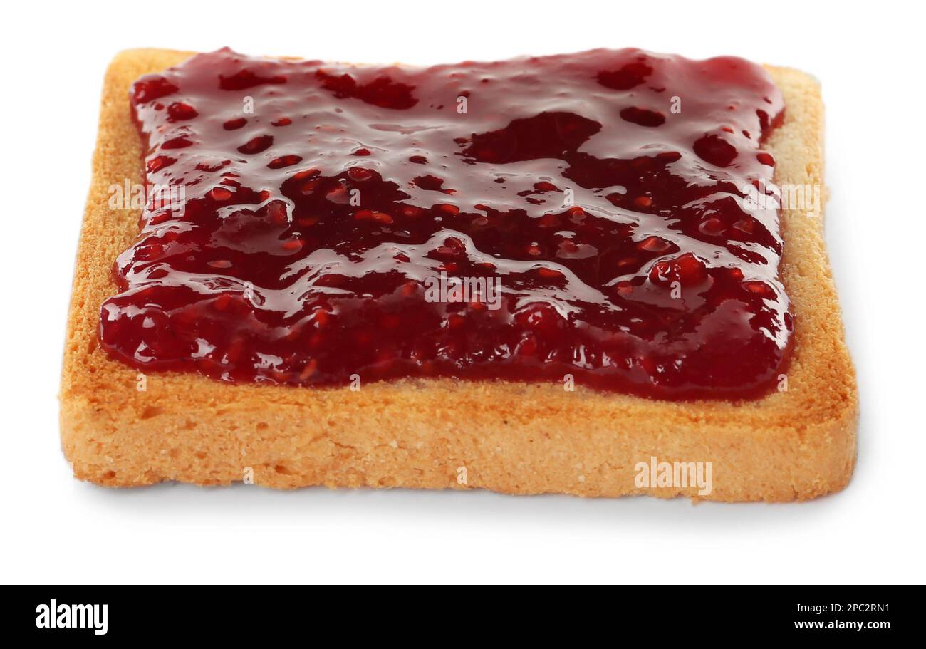 Toast with tasty raspberry jam on white background Stock Photo - Alamy