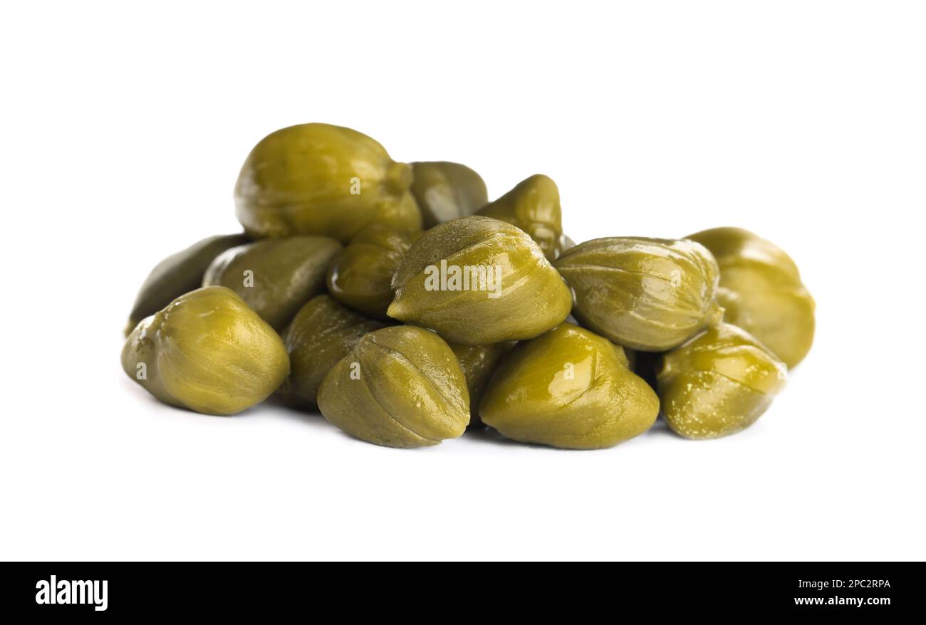 Pile of delicious pickled capers on white background Stock Photo - Alamy