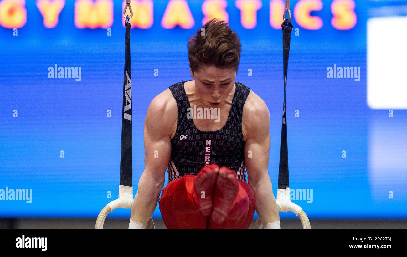Nebraska gymnast Chris Hiser competes on the rings of an NCAA ...