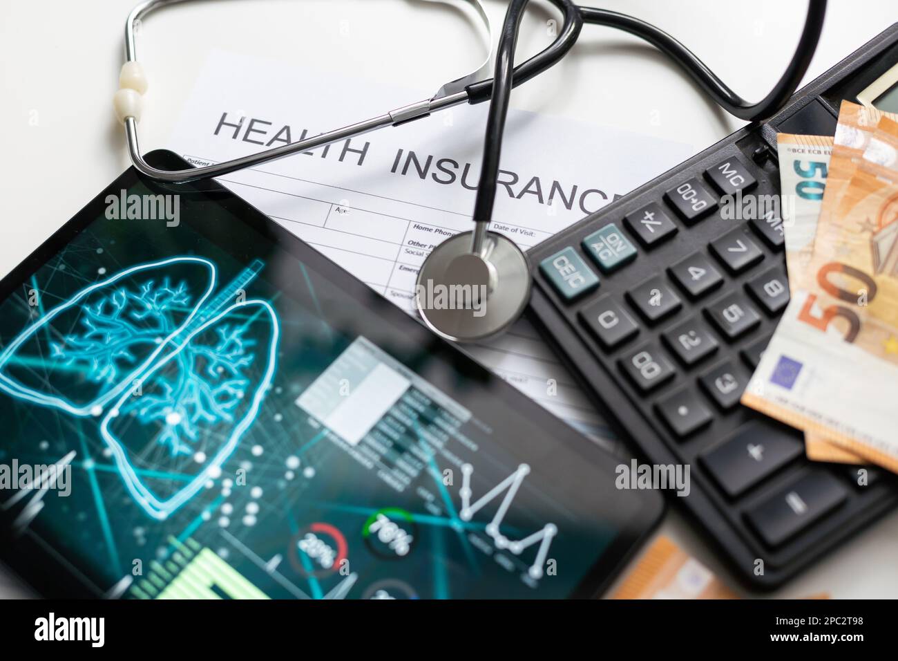 Modern social health insurance program. Tablet computer with healthcare ...