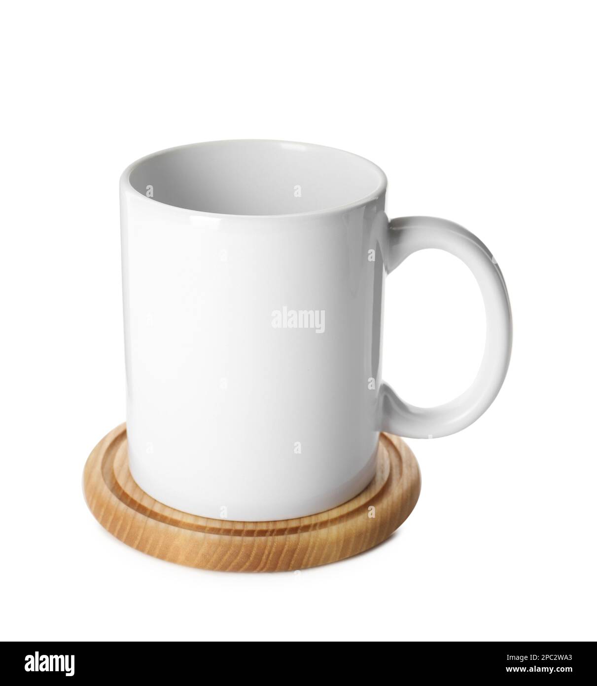 Mug and stylish wooden coaster on white background Stock Photo - Alamy