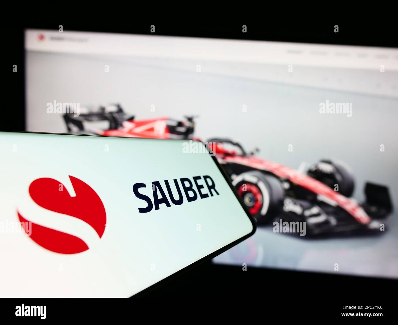 Smartphone with logo of Swiss automotive company Sauber Motorsport AG ...