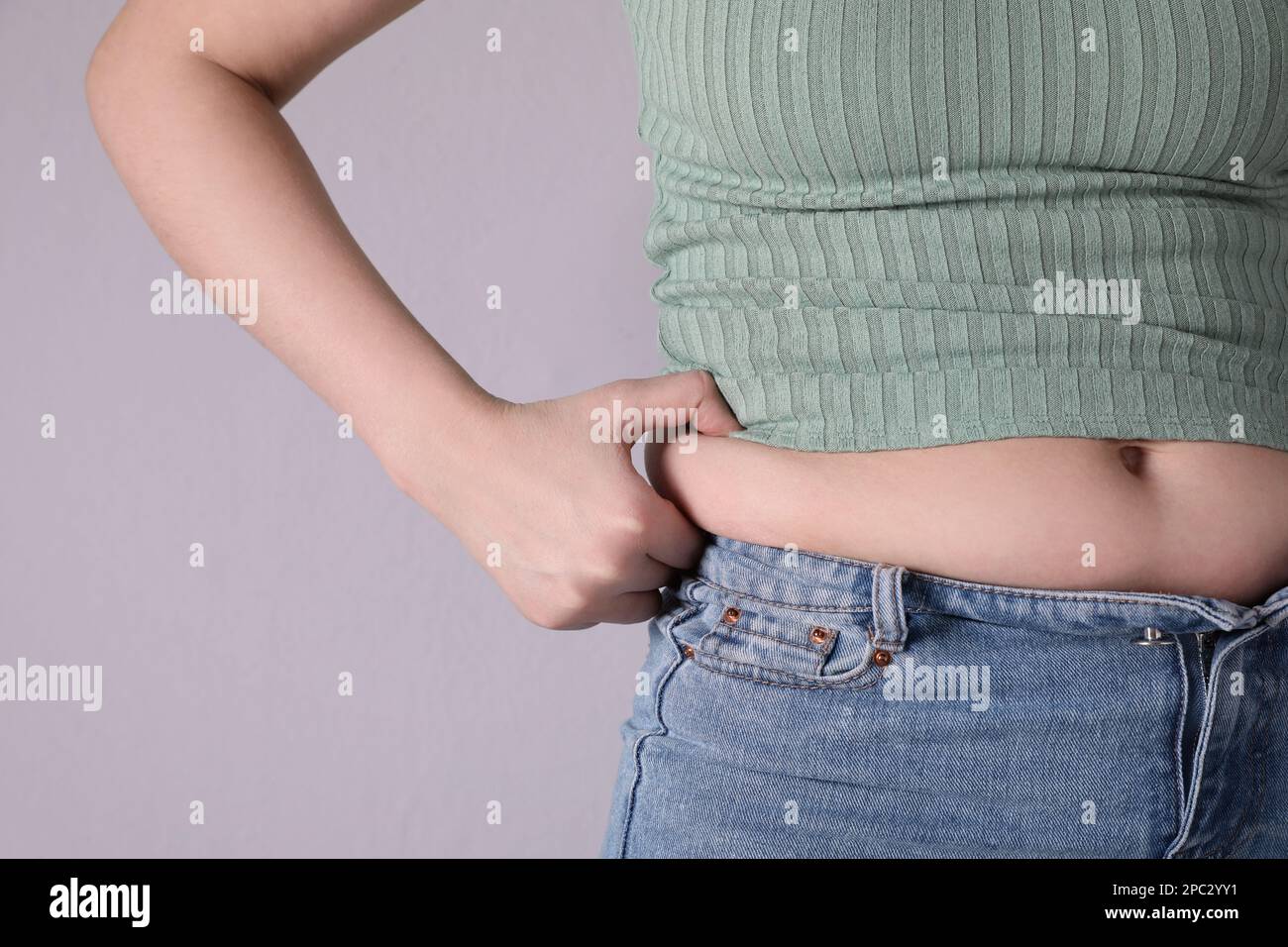 Woman fat clothes tight hi-res stock photography and images - Alamy