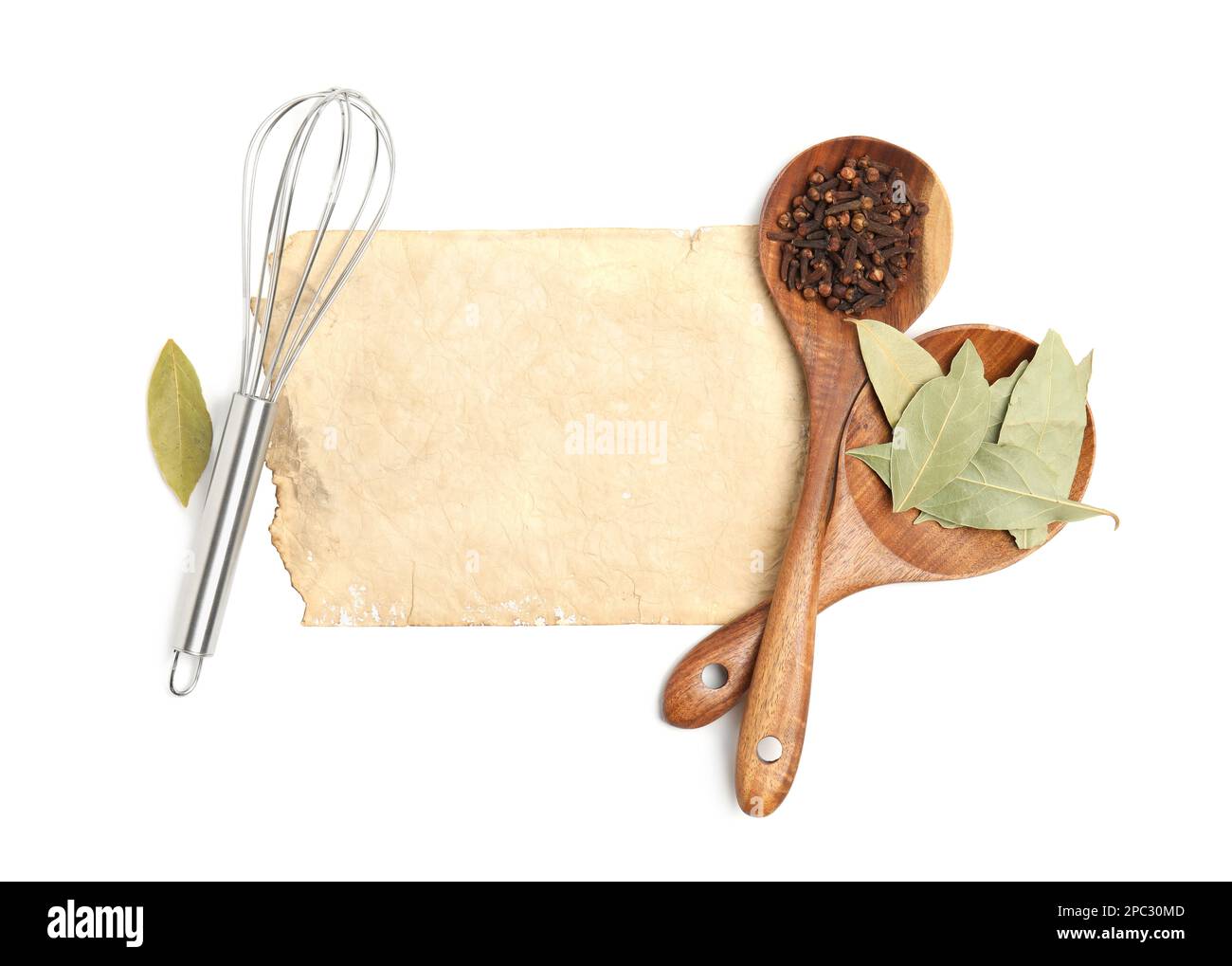 Old cookbook page, spices and kitchen utensils on white background, top ...
