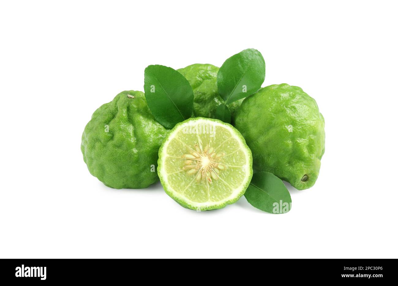Fresh ripe bergamot fruits and green leaves on white background Stock ...