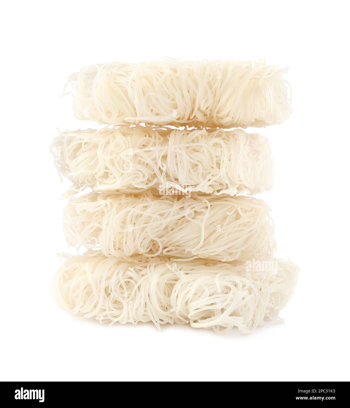 Bricks of dried rice noodles isolated on white. East Asian cuisine ...