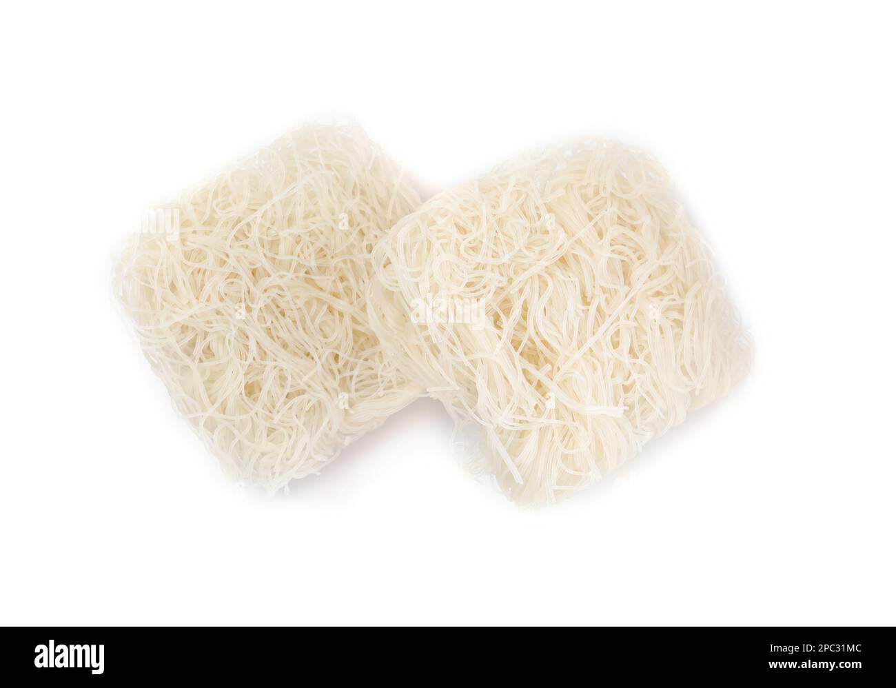 Bricks of dried rice noodles on white background, top view Stock Photo ...
