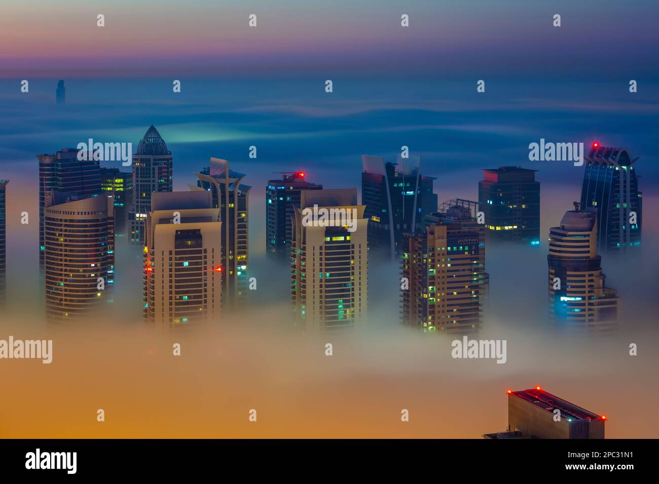 Dubai skyline fog hi-res stock photography and images - Alamy