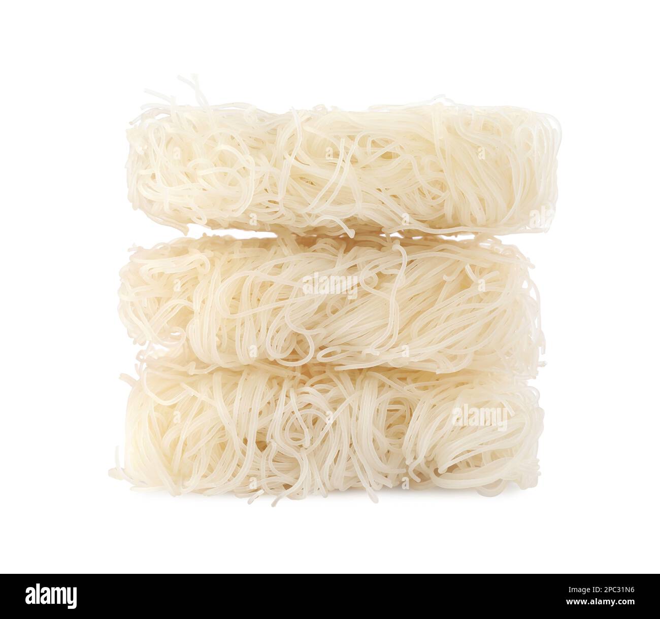 Bricks of dried rice noodles isolated on white. East Asian cuisine ...