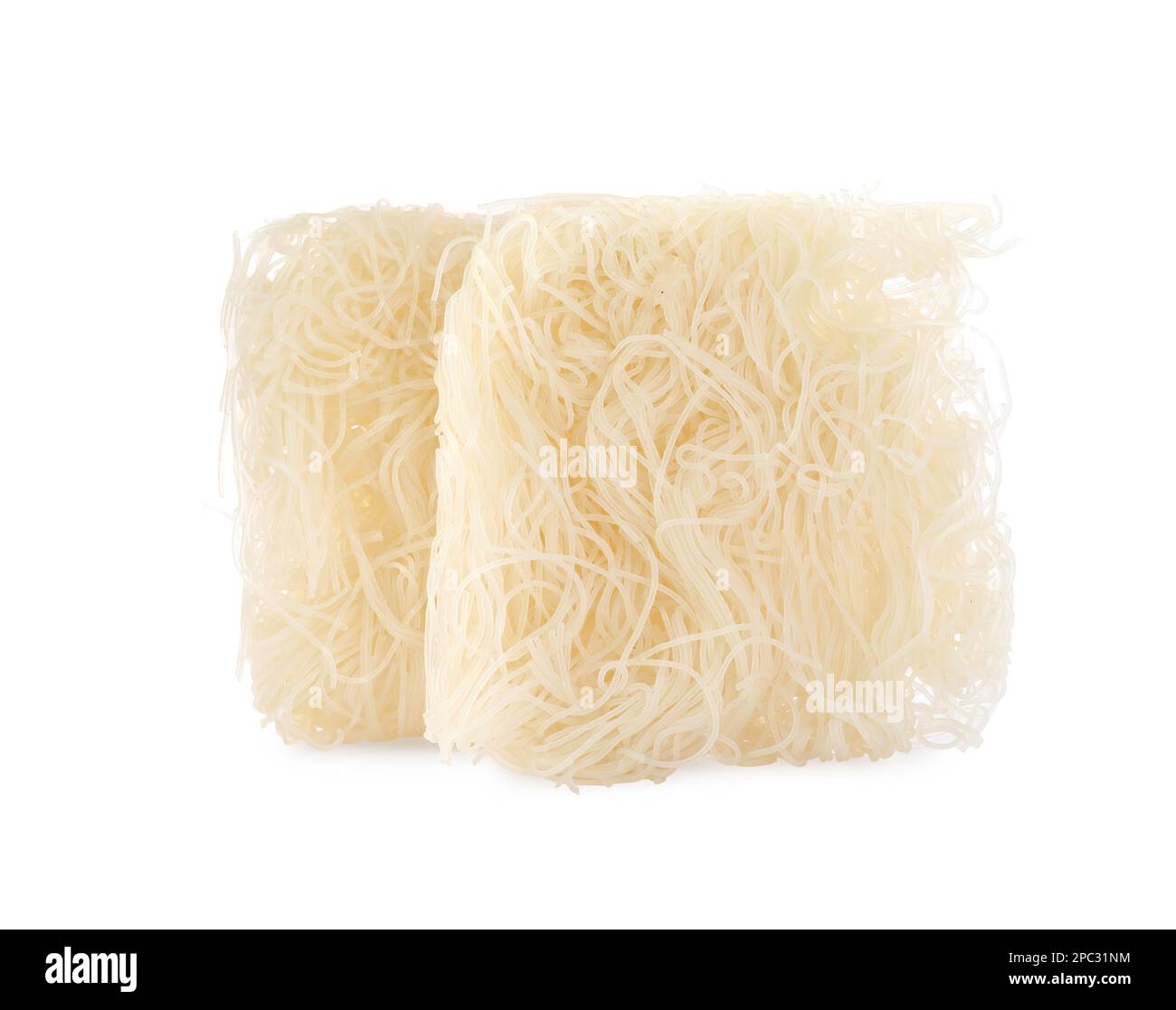 Bricks of dried rice noodles isolated on white. East Asian cuisine ...