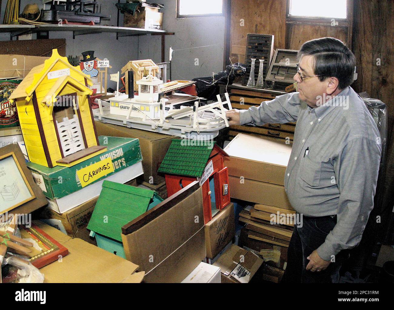 ** APN ADVANCE FOR SUNDAY, JAN. 28 **Art Borum digs through items ...