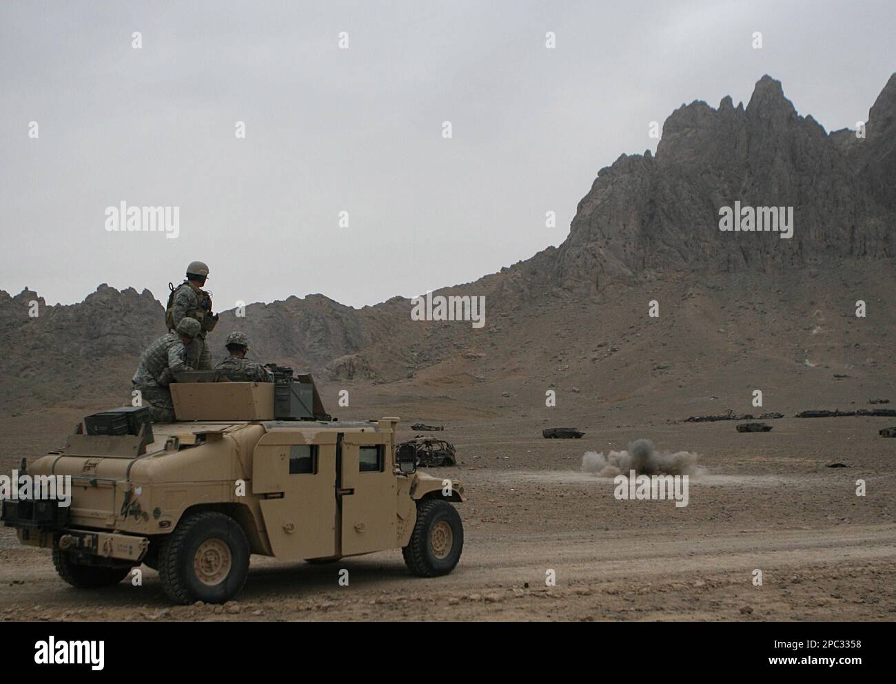 U.S. Special Force soldiers fire during a heavy range firing training ...
