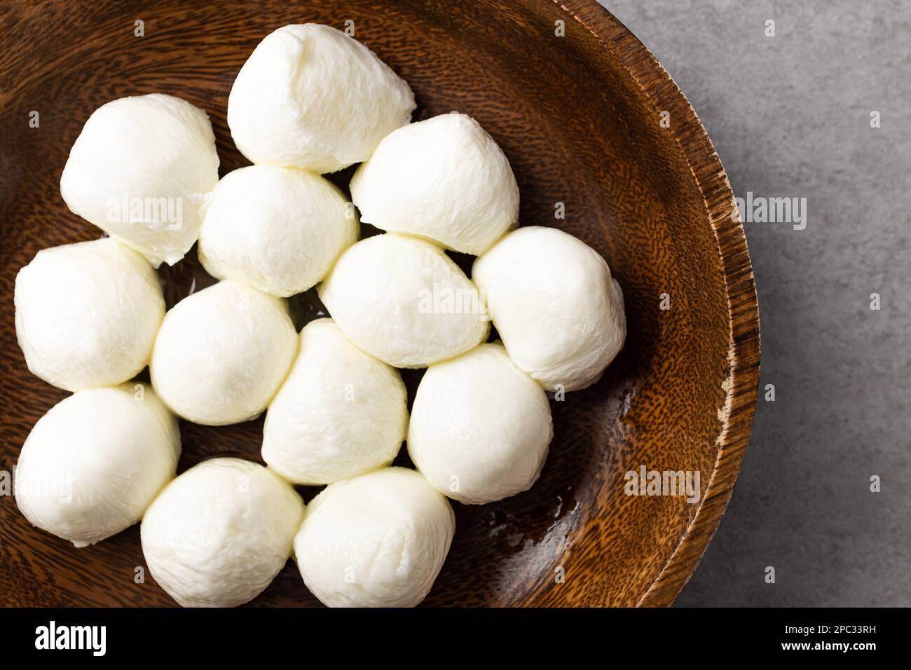 Soft and light mozzarella pearls cheese Stock Photo - Alamy