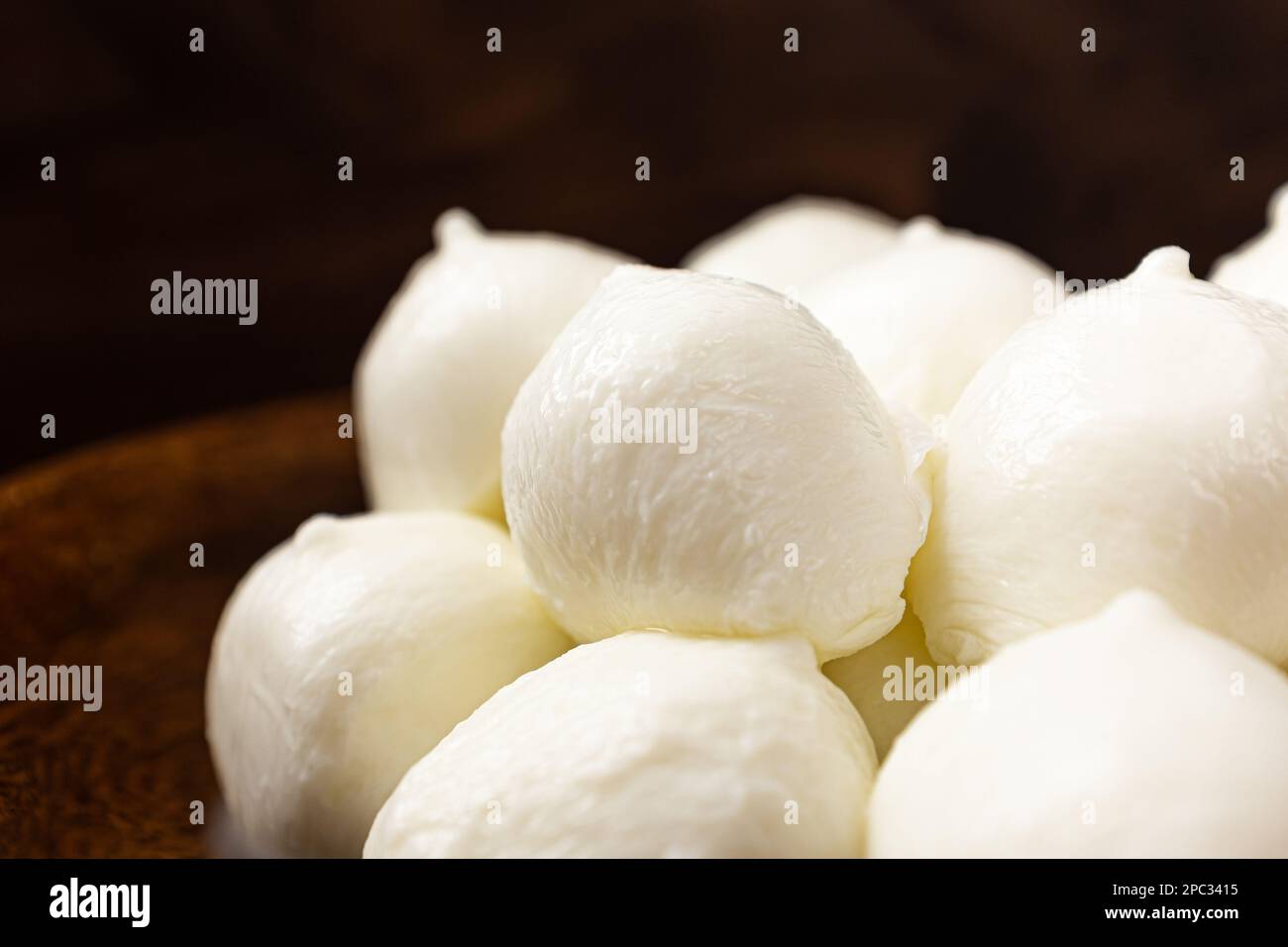 Soft and light mozzarella pearls cheese Stock Photo - Alamy