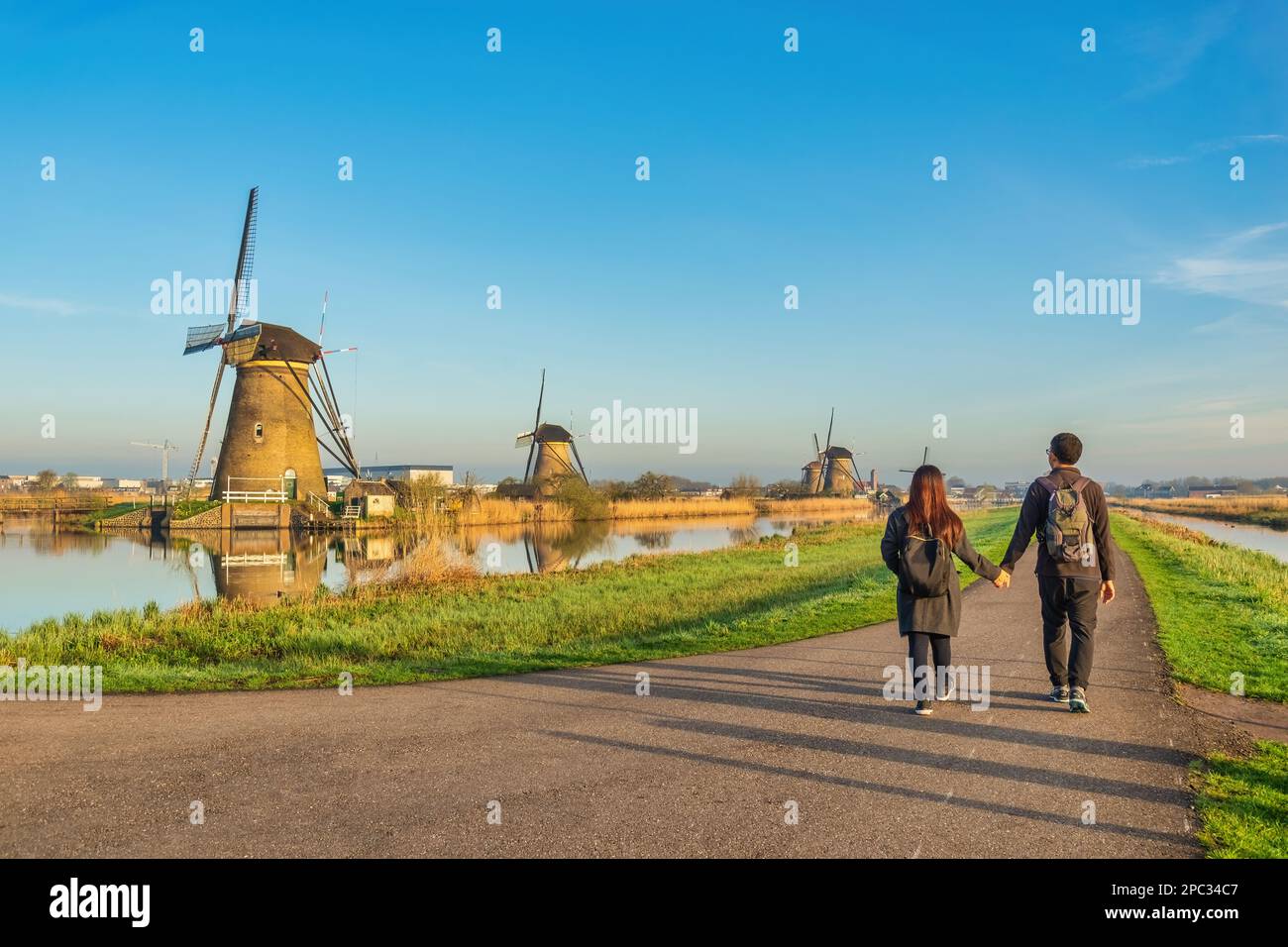 Dutch Windmill landscape at Kinderdijk Village Netherlands Stock Photo ...