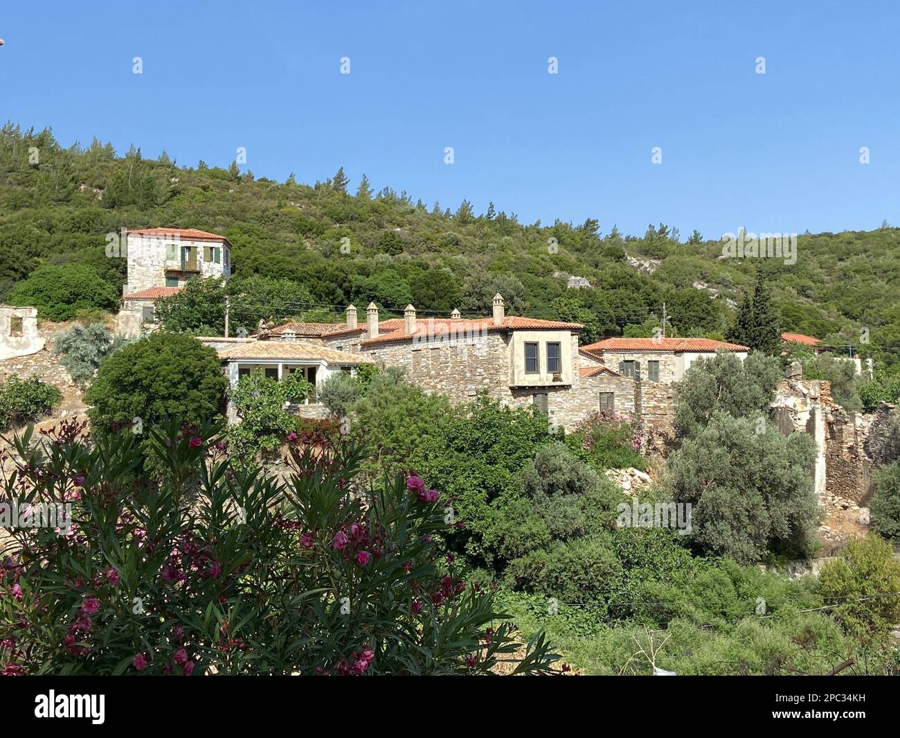 Urban old village with traditional stone house with wooden sunshade ...