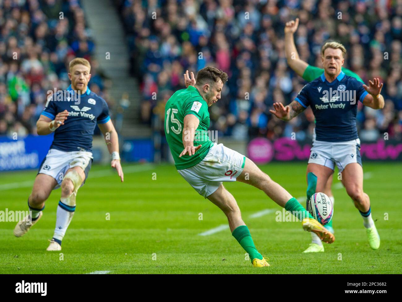 Guinness Six Nations 2023. IrelandÕs Hugo Keenan kicks the ball as ...